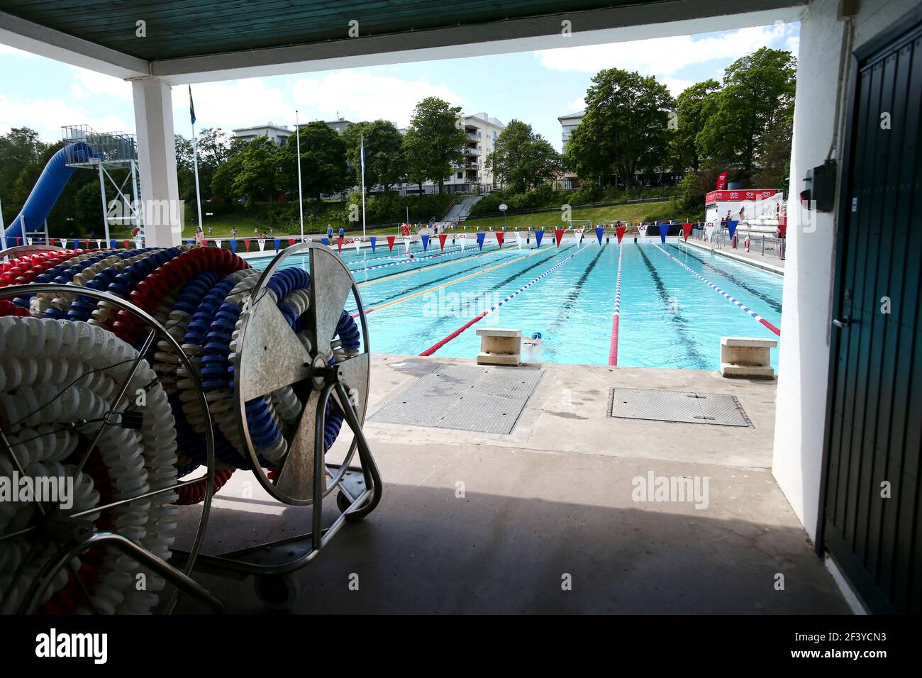 Swimmer in the outdoor pool Tinnerbäcksbadet, Tinnis, in central ...