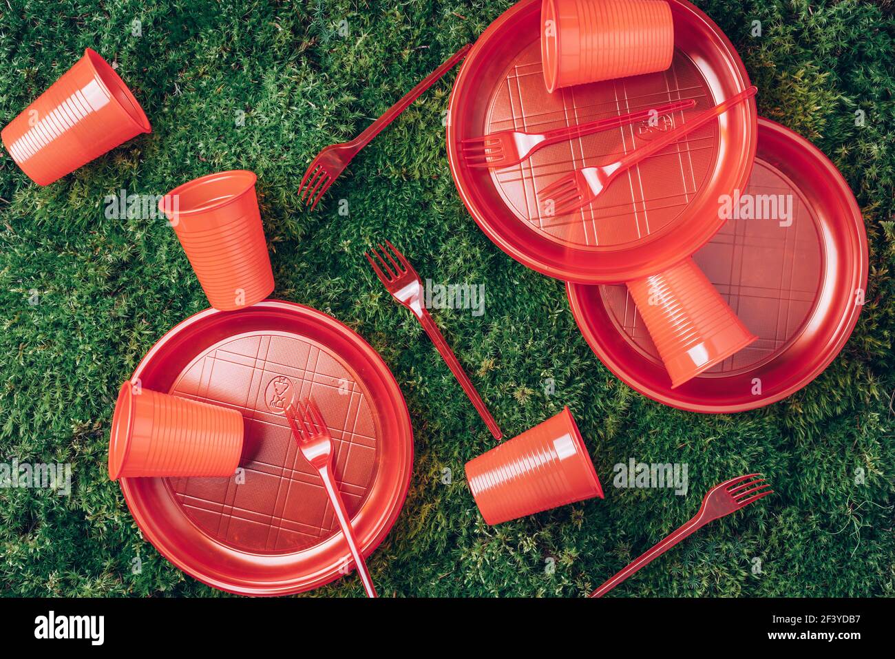 Recycling plastic and ecology. Disposable plastic tableware - plates ...