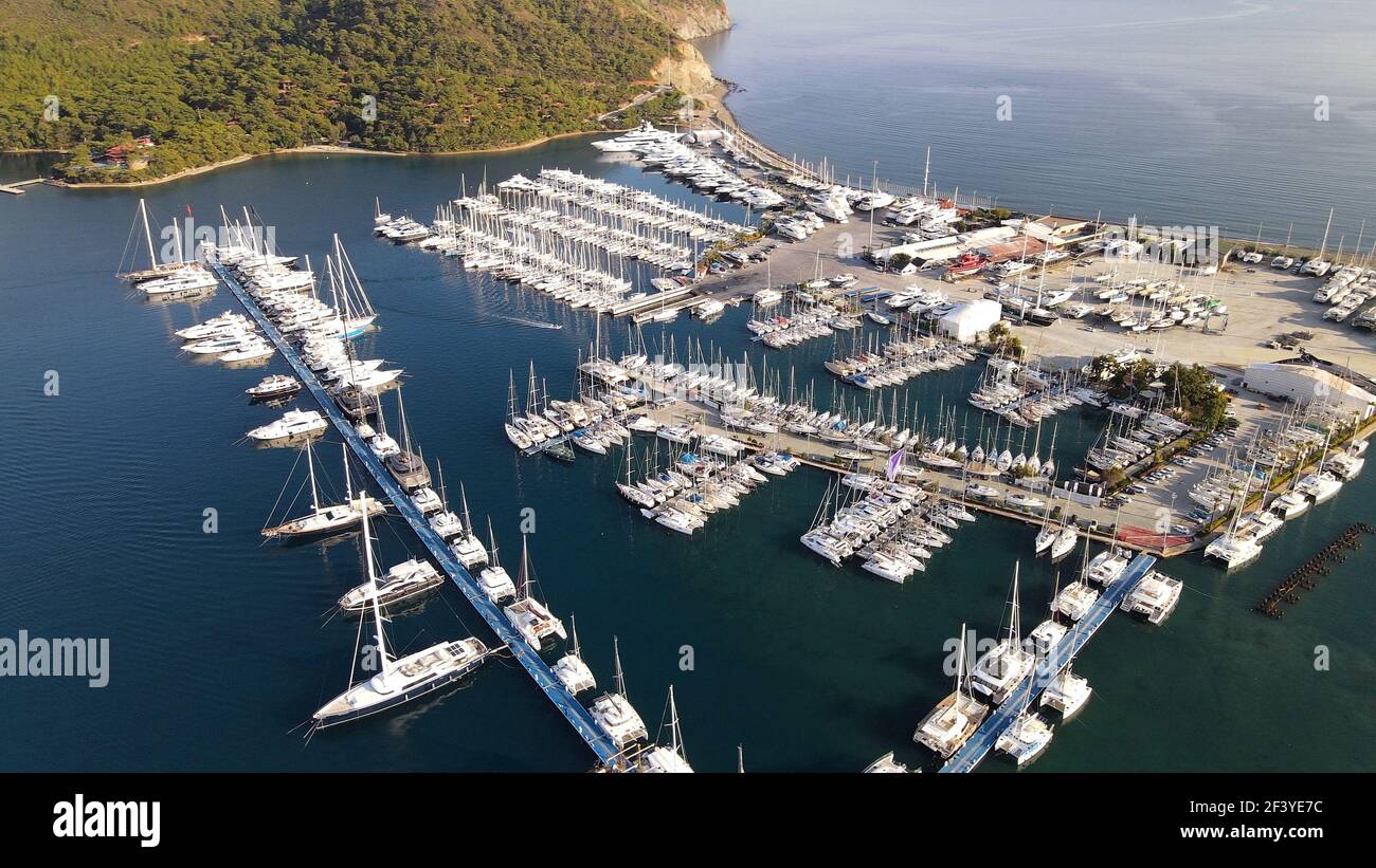 Sailboats With Deflated Sails At Dockside In Sea Bay Stock Photo - Alamy