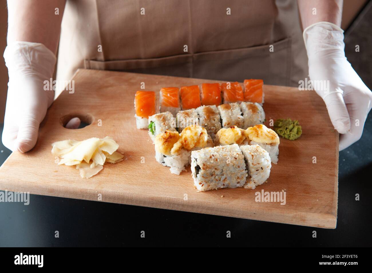Asian waitress holding plates hi-res stock photography and images - Alamy