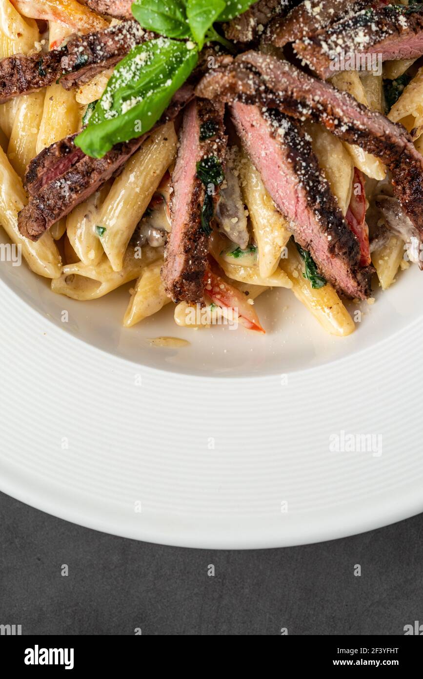 Pasta with sliced beef hi-res stock photography and images - Alamy