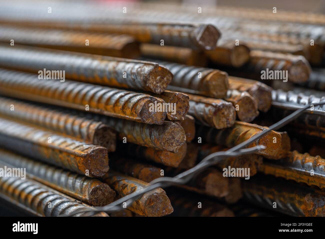 A stacked of rusty metal steel rods on the construction site Stock ...