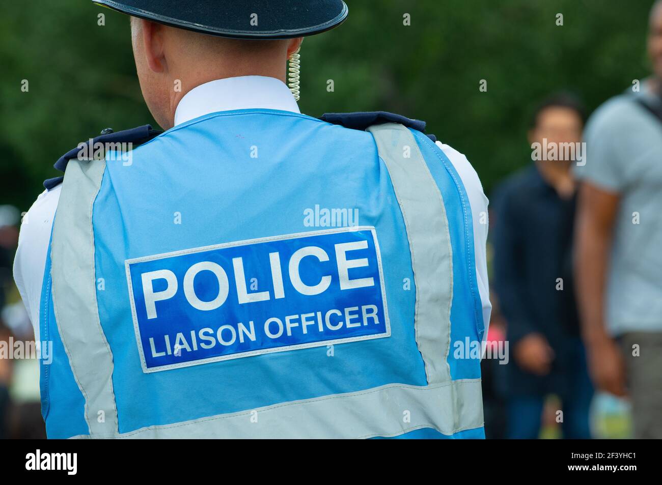 Metropolitan Police liaison officer wearing high visibility vest ...