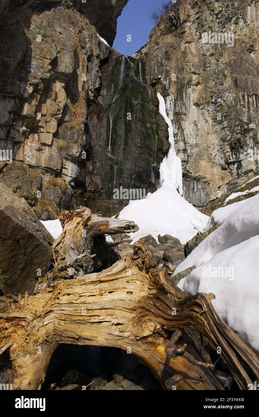 The thaw. Waterfall at spring Stock Photo - Alamy