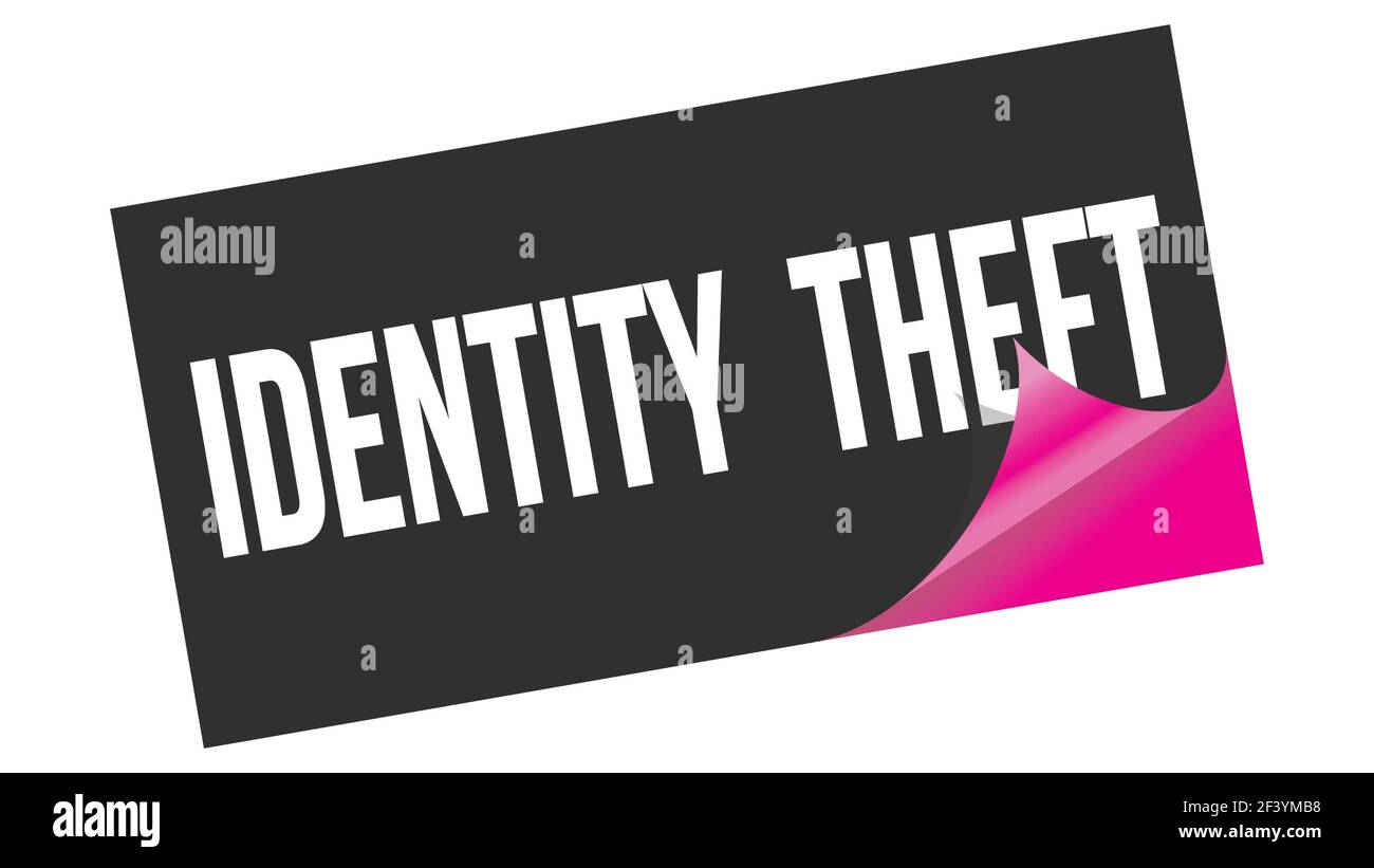 IDENTITY THEFT text written on black pink sticker stamp Stock Photo - Alamy