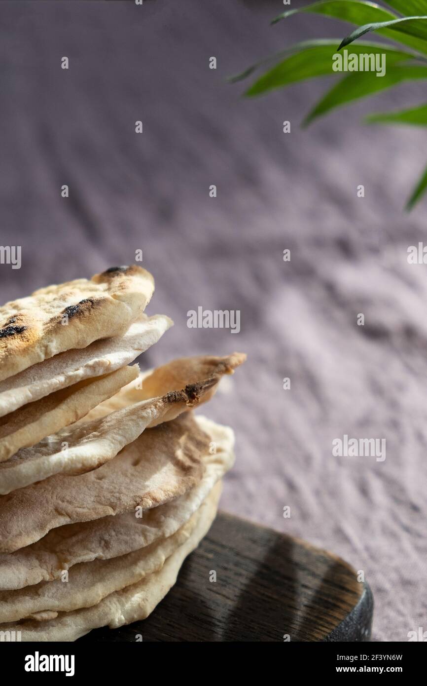 vertical. Homemade matzo with microgreen peas. Unleavened flatbread ...