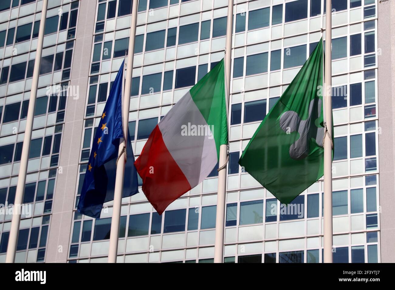milan - lombardy region - flags at half mast to commemorate the covid ...