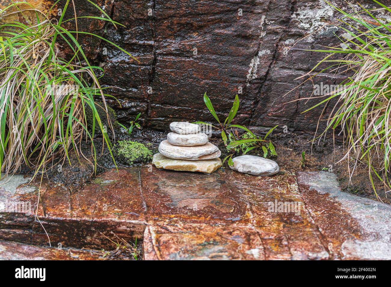 Piled rocks, rocks piled up to make a wish. Rock sculpture on a eco ...