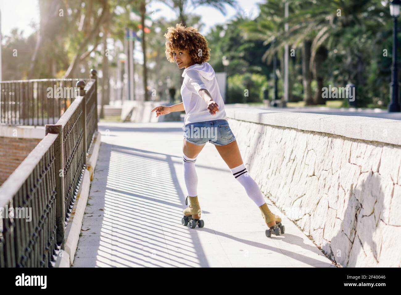 African american girl roller skating hi-res stock photography and ...