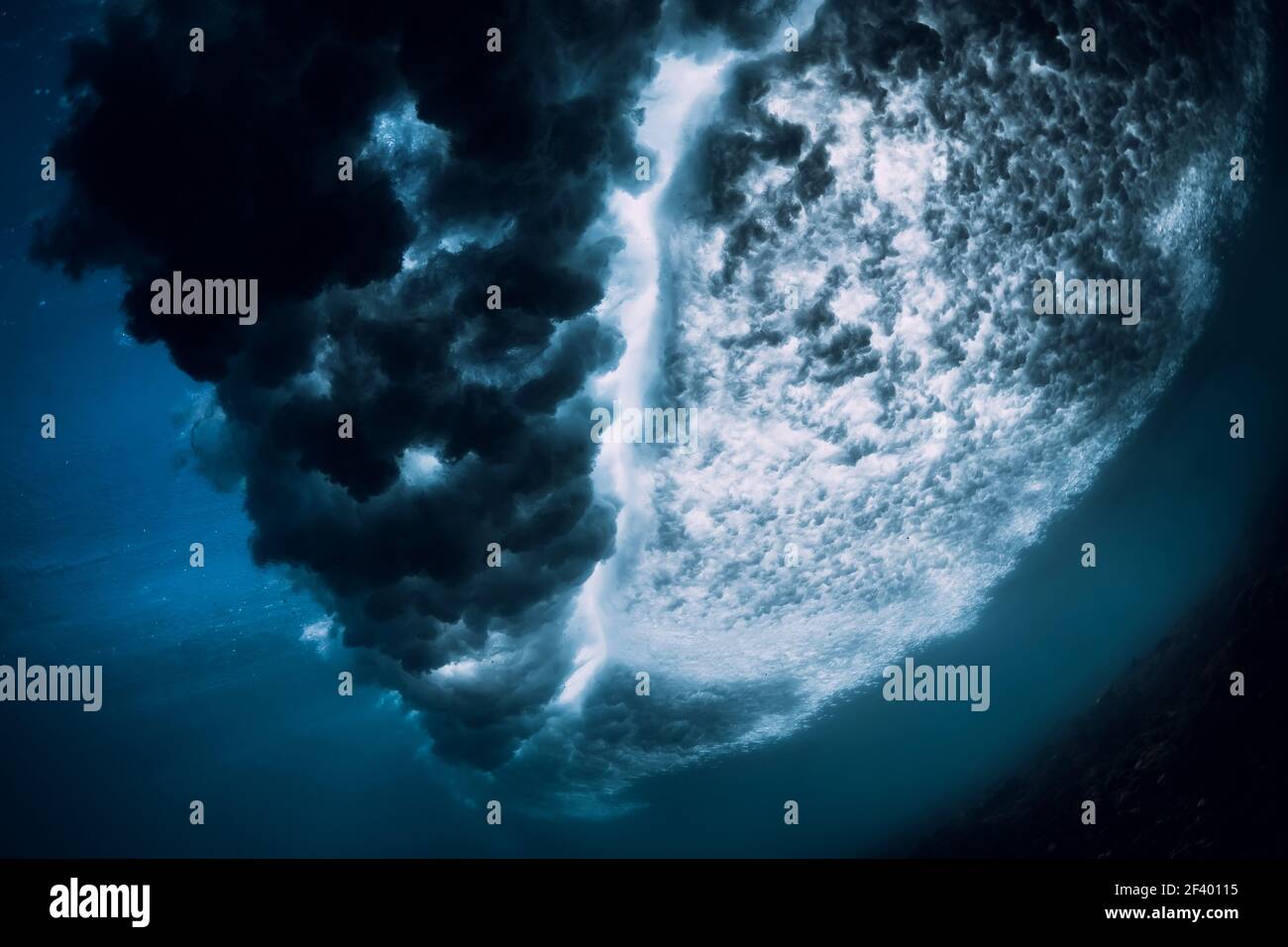 Wave underwater with foam, bubbles and sunlight. Transparent ocean in ...