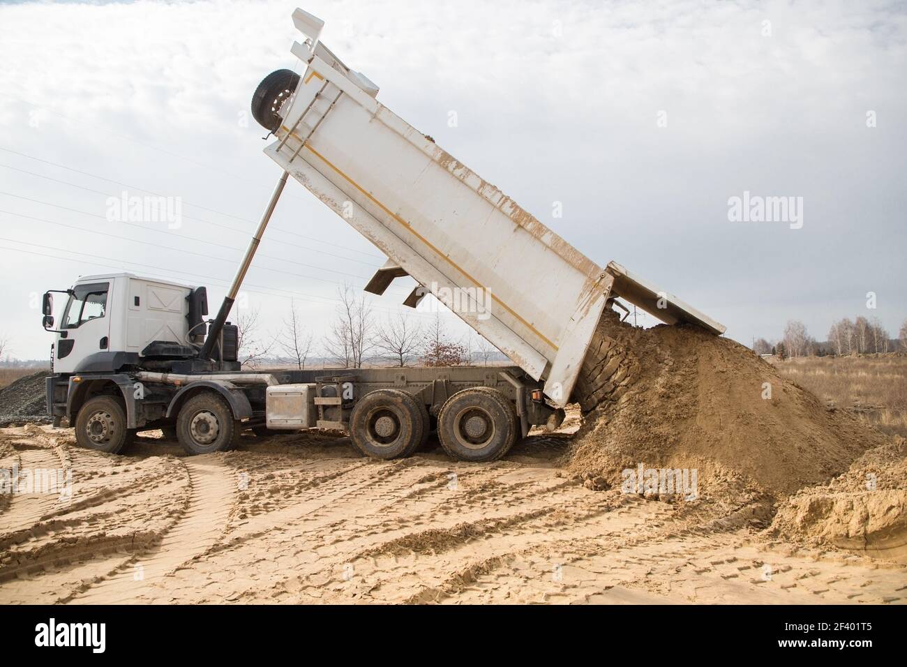 Dump truck unloading sand hi-res stock photography and images - Alamy