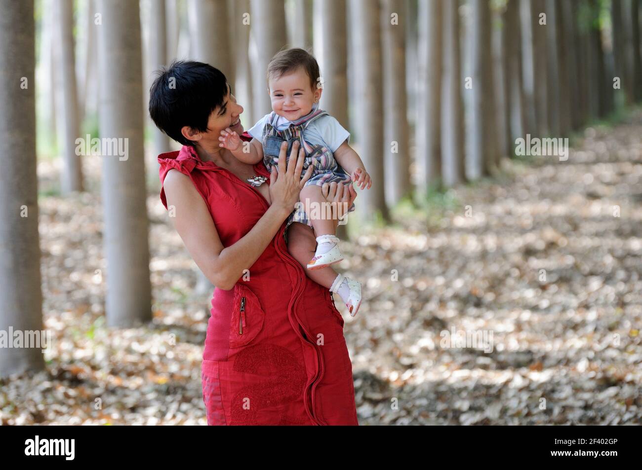Mother and daughter in the forest Stock Photo - Alamy