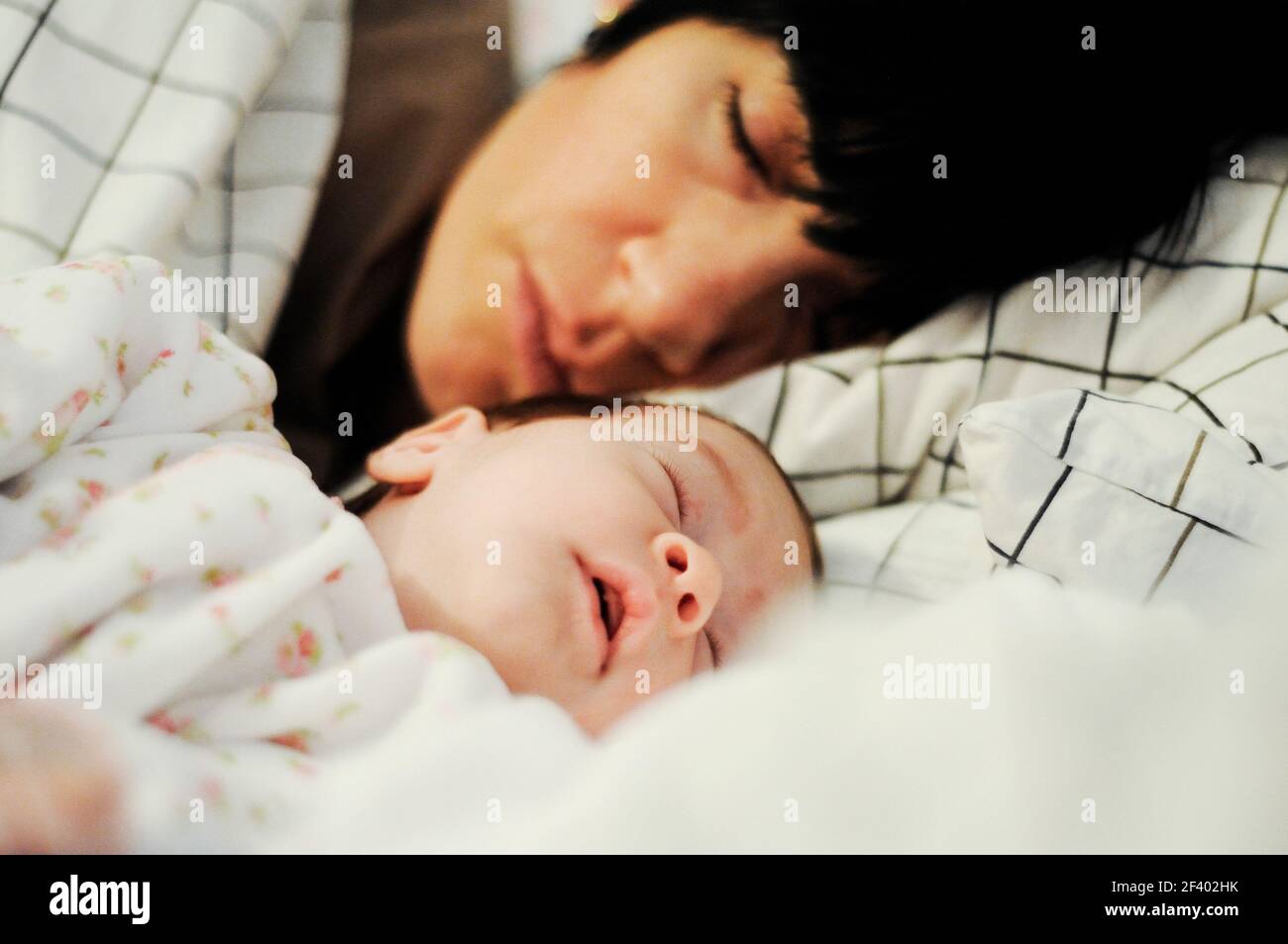 Mother son sleeping together hi-res stock photography and images - Alamy
