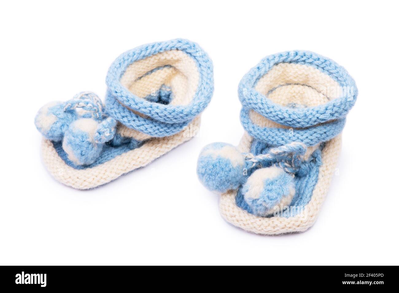 Pair of baby bootees isolated on white background Stock Photo - Alamy