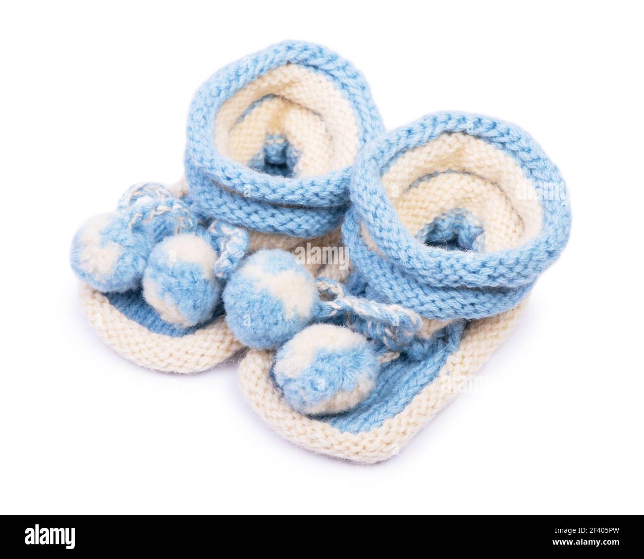 Pair of baby bootees isolated on white background Stock Photo - Alamy