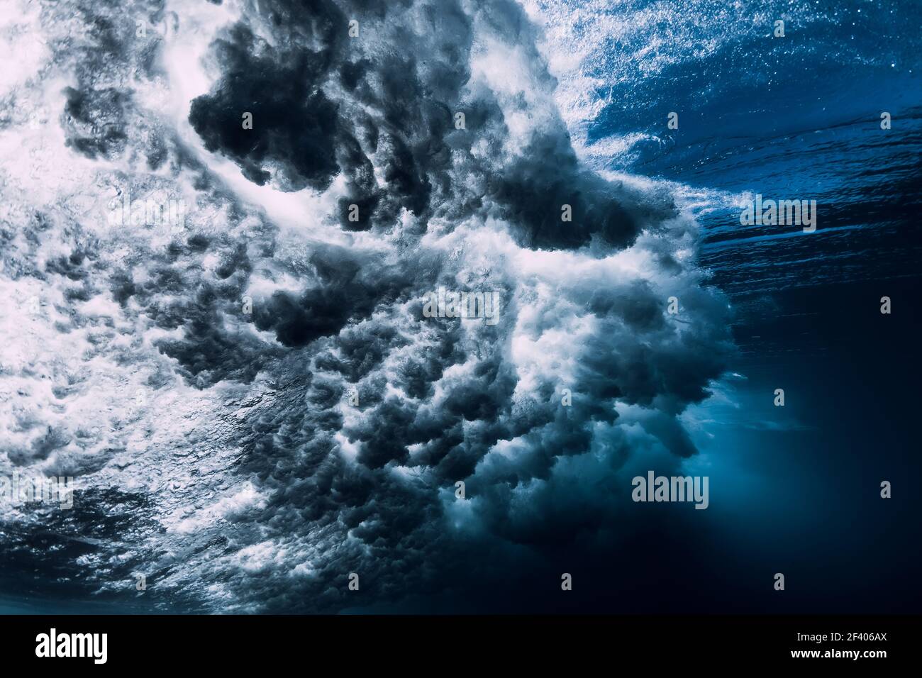 Wave underwater with foam, bubbles and sunlight. Transparent ocean in ...