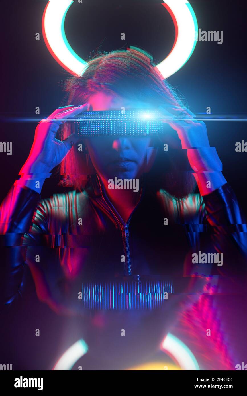 Cyberpunk style portrait of beautiful young woman in futuristic costume ...