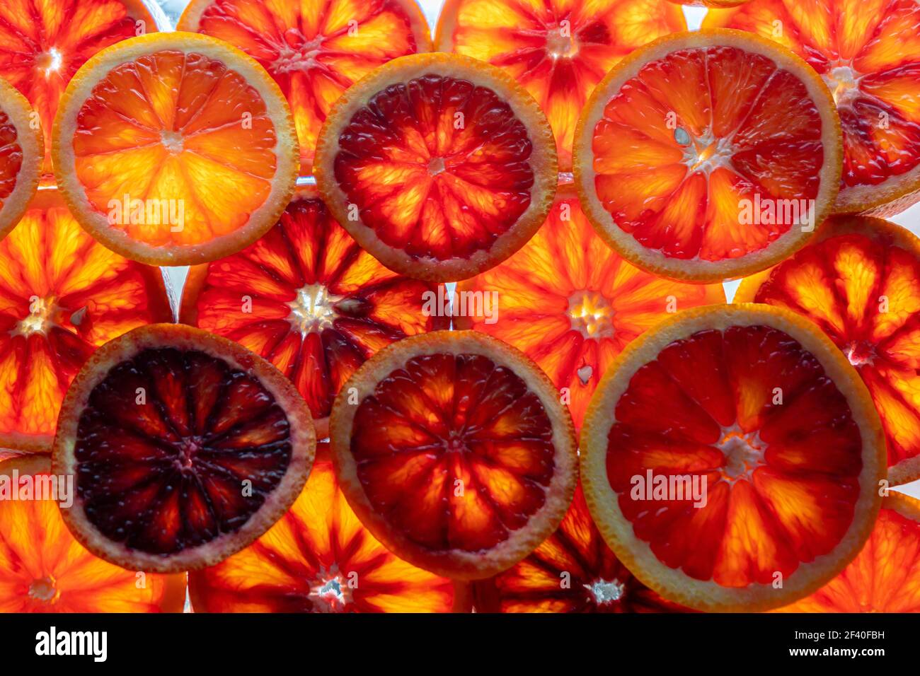 Red oranges fruit background. Sliced juicy orange. Food. Summer concept ...