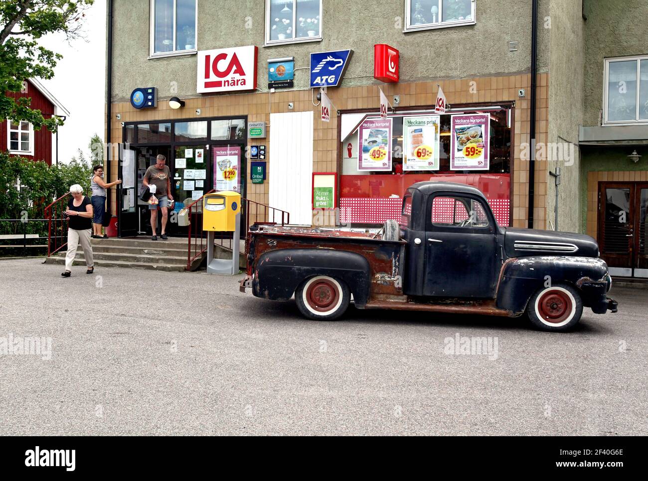 Ica grocery store in the countryside with an old car outside Stock ...