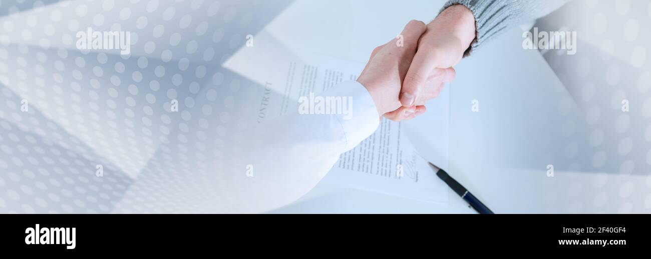 Handshake after contract signing; panoramic banner Stock Photo - Alamy