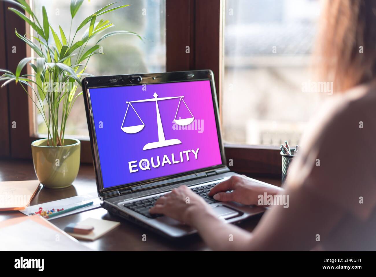 Laptop screen displaying an equality concept Stock Photo - Alamy