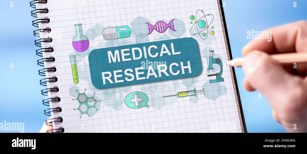 Hand drawing medical research concept on a notepad Stock Photo - Alamy