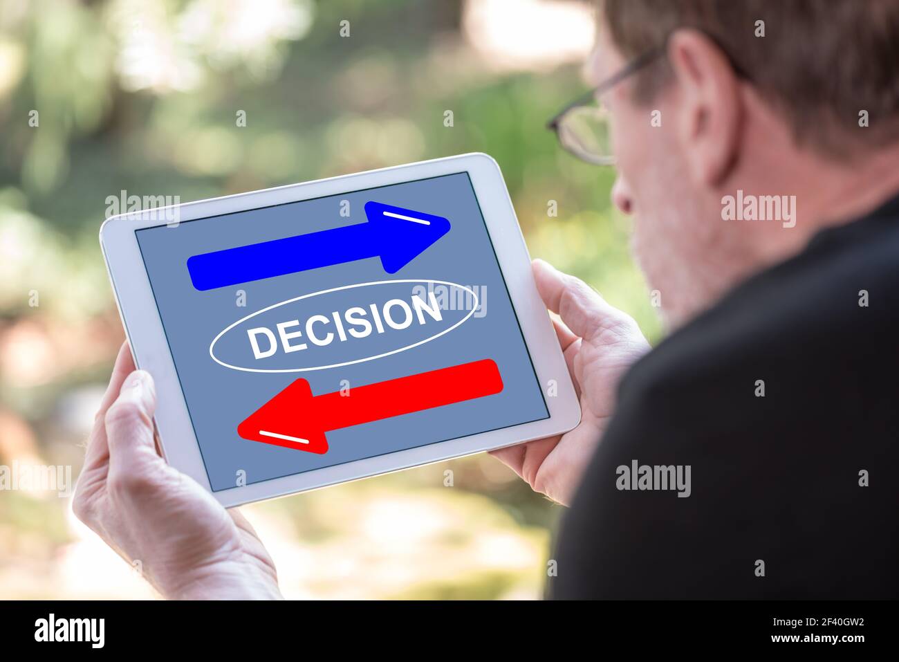 Tablet screen displaying a decision concept Stock Photo - Alamy