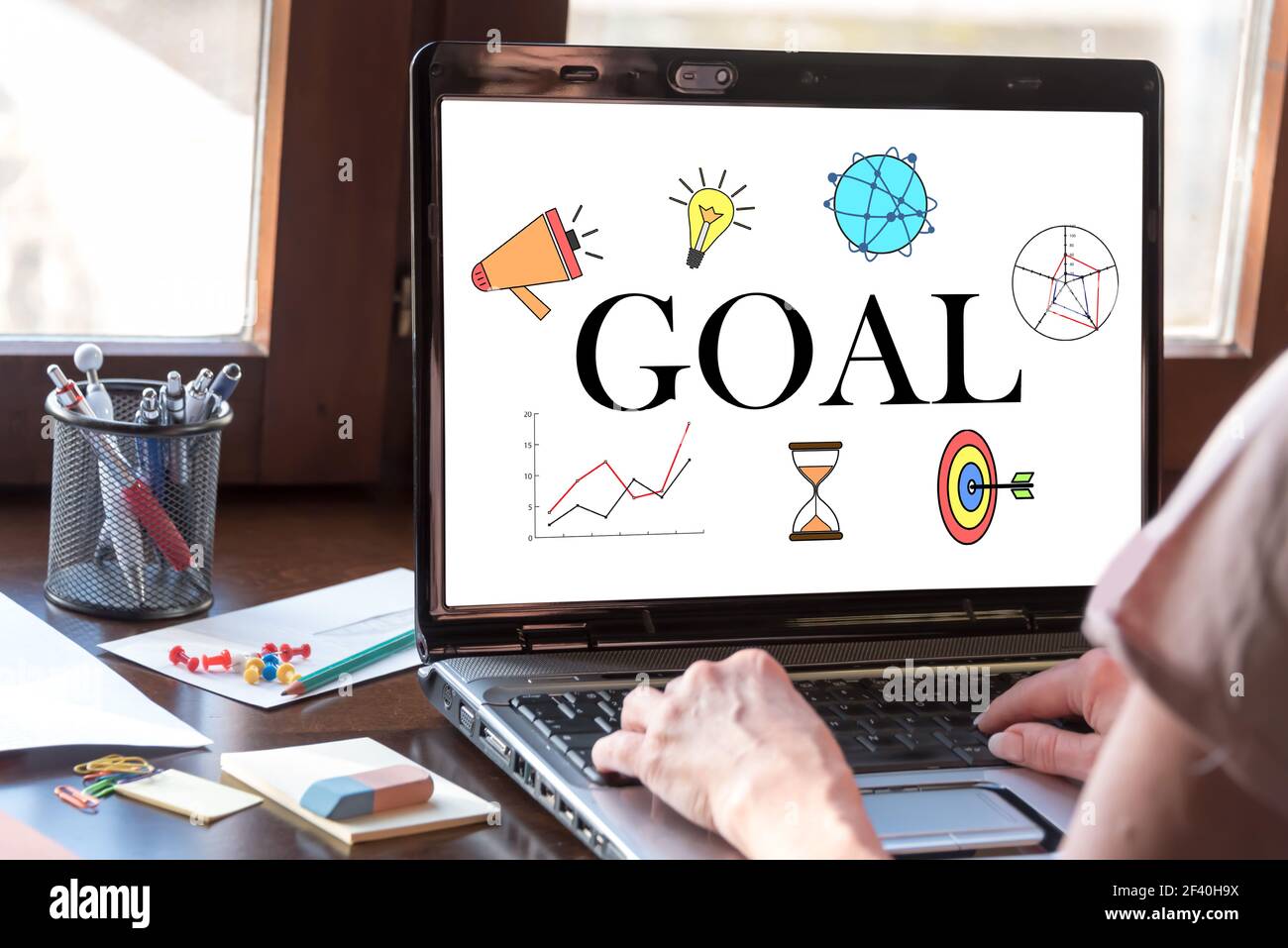 Laptop screen displaying a goal concept Stock Photo - Alamy