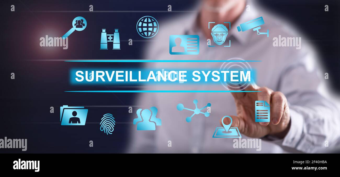 Man touching a surveillance system concept on a touch screen with his ...