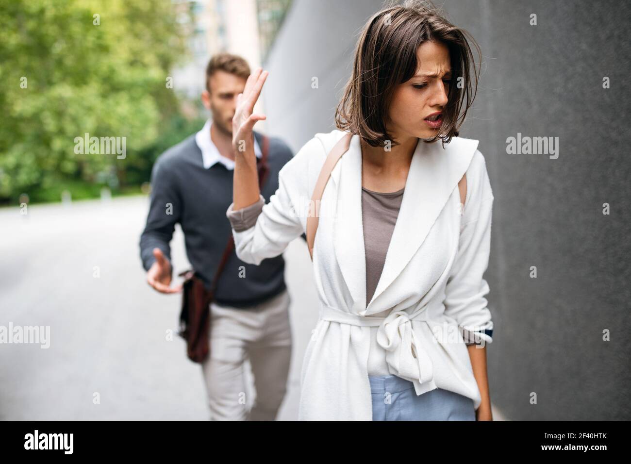 Woman sad man street hi-res stock photography and images - Alamy