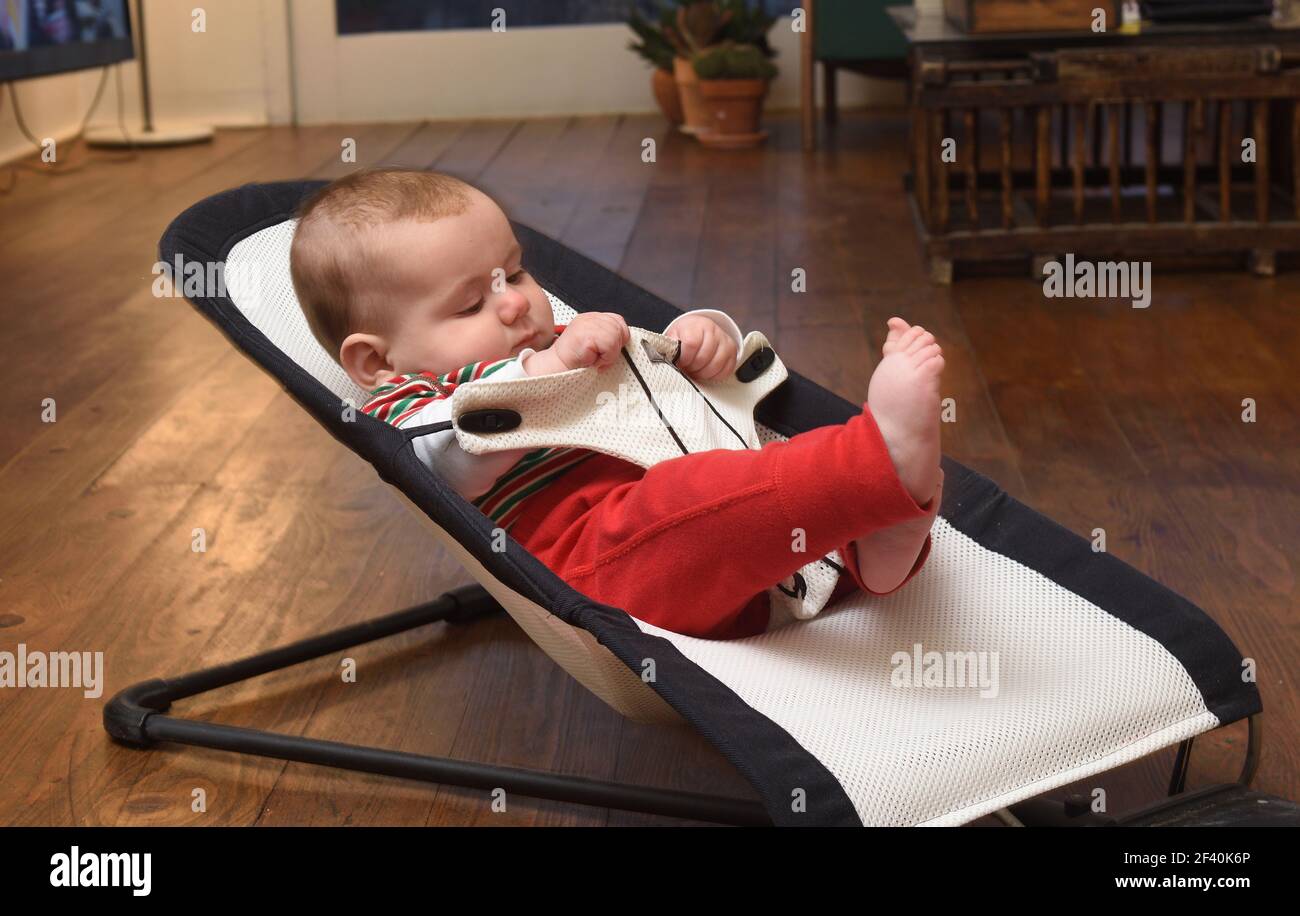 Baby in a hammock hi-res stock photography and images - Alamy