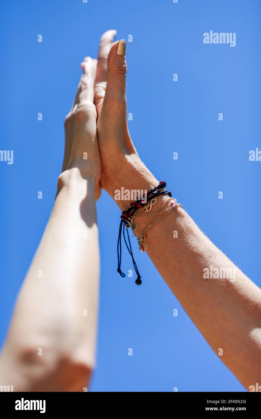 Clasping hand hi-res stock photography and images - Alamy