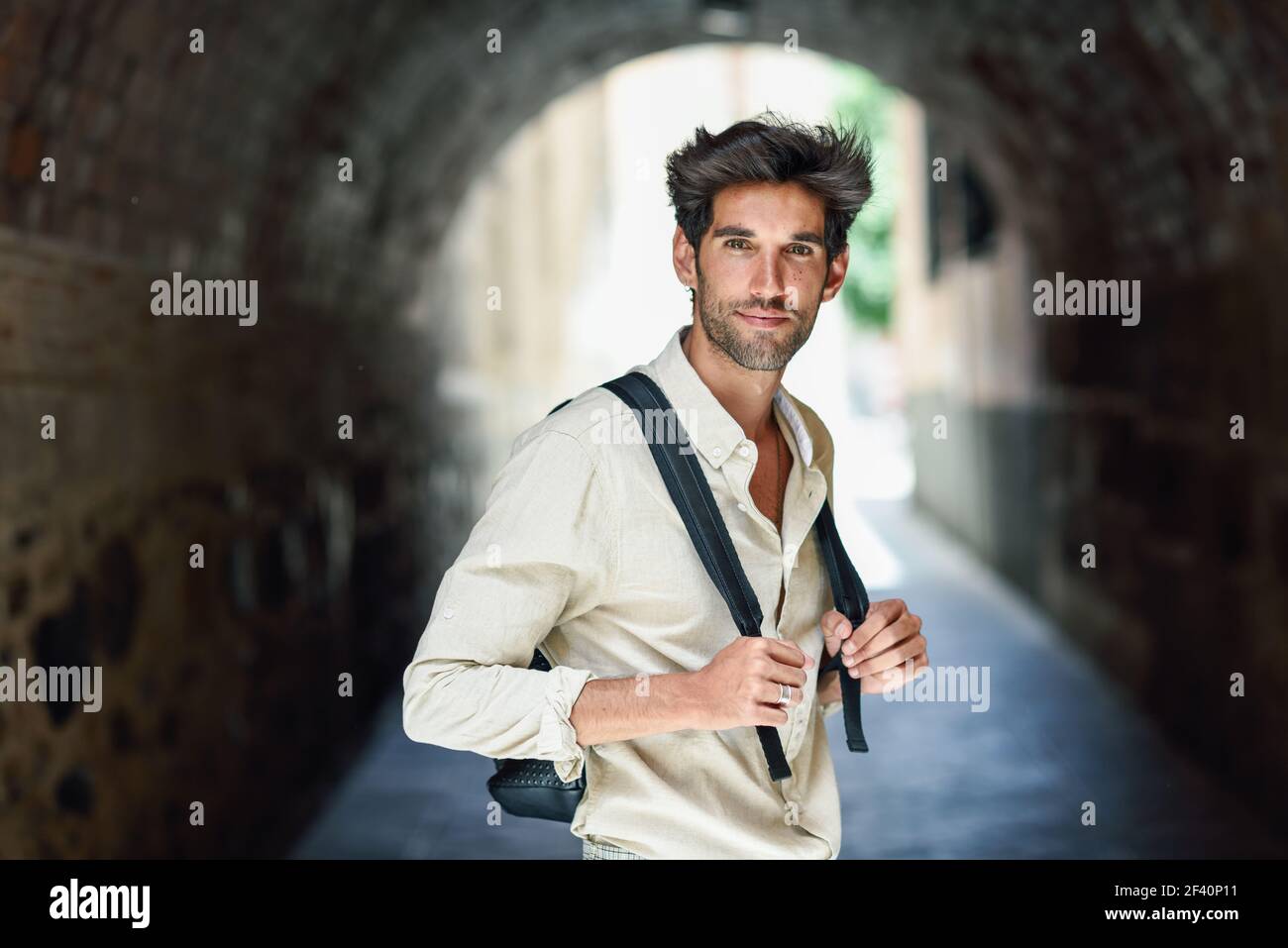 Young man sightseeing enjoying the streets of Granada, Spain. Male ...