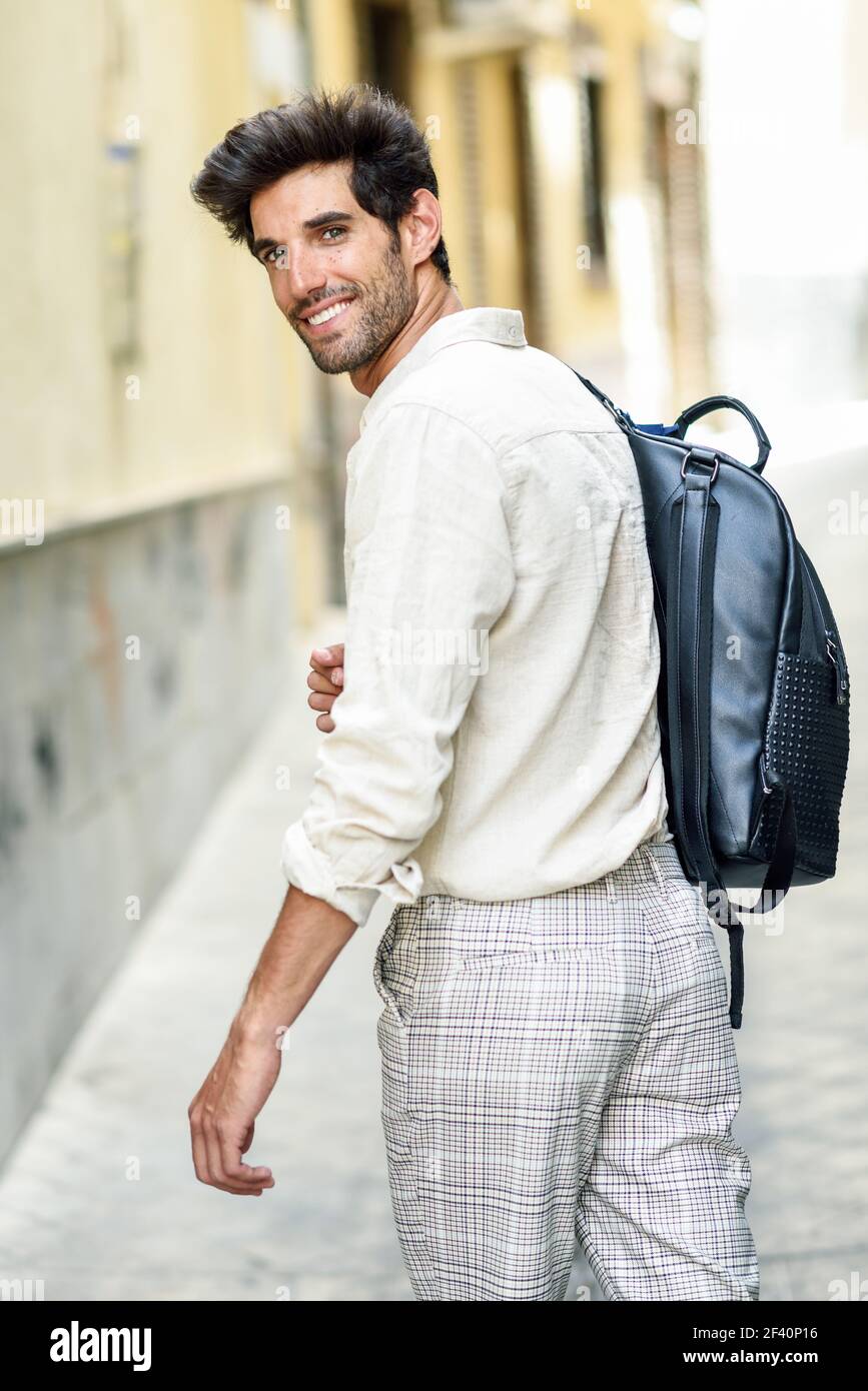 Young man sightseeing enjoying the streets of Granada, Spain. Male ...