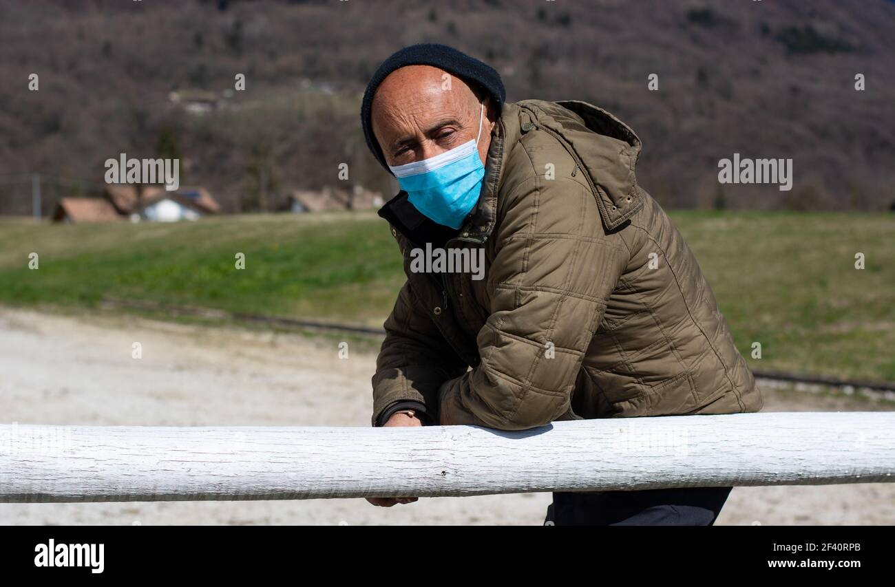 the melancholy and sad man with the mask Stock Photo - Alamy