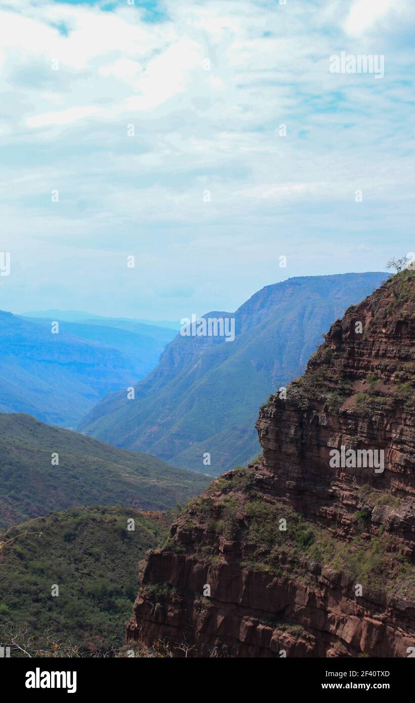 A vertical high angle shot of the cliffs captured during the daytime ...