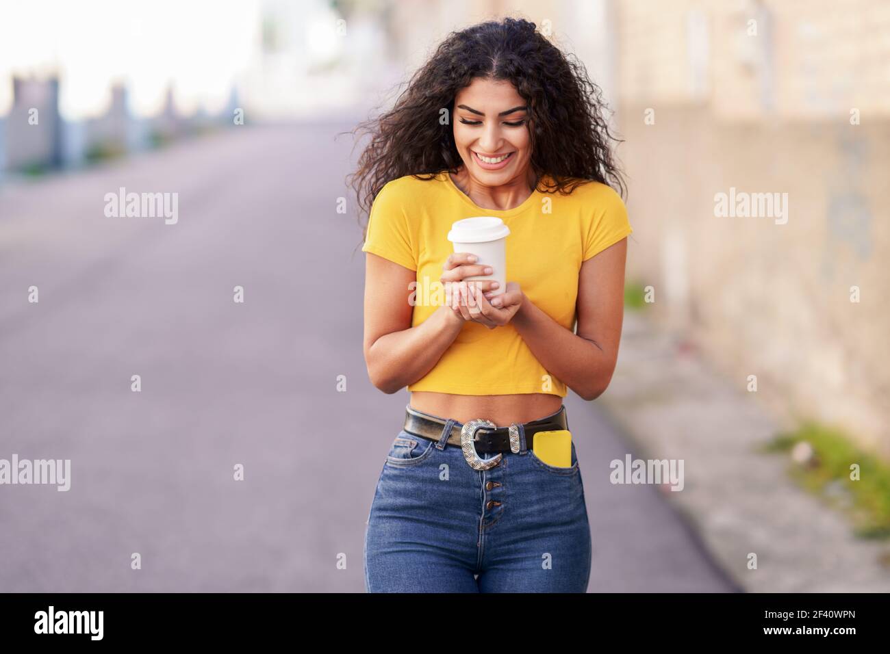 Muslim girl walking hi-res stock photography and images - Alamy