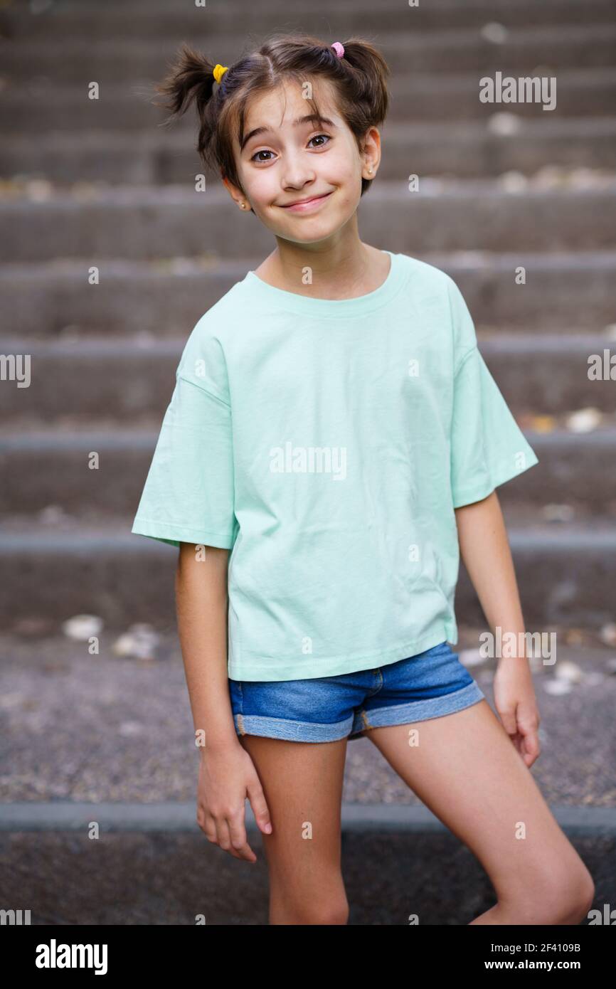 Girl seated on steps hi-res stock photography and images - Alamy