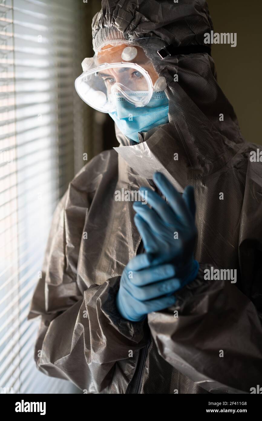 Worried Doctor or lab technician scientist in PPE Personal Protective ...