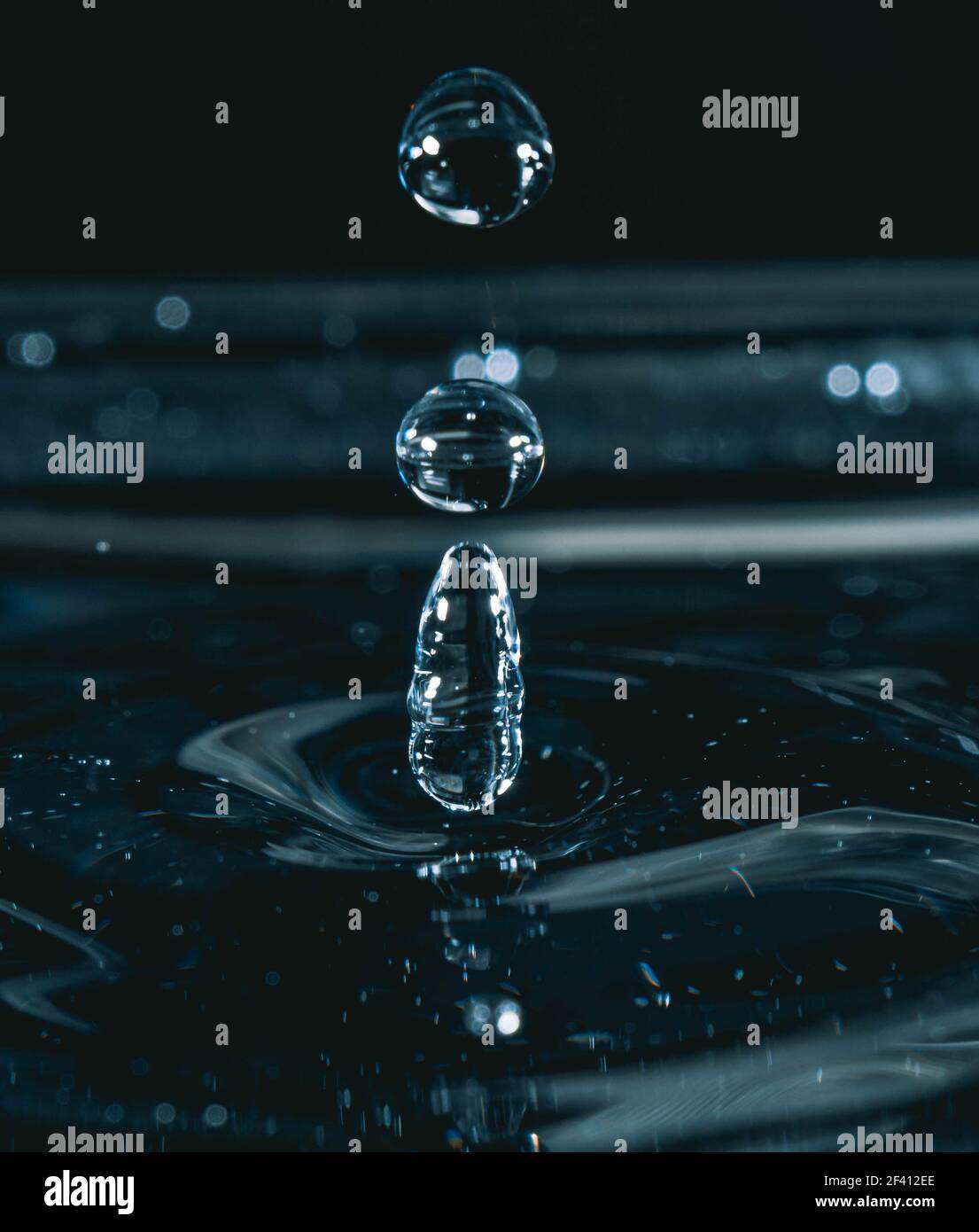 Colored water drop, circle ripples, splash of water, closeup Stock ...