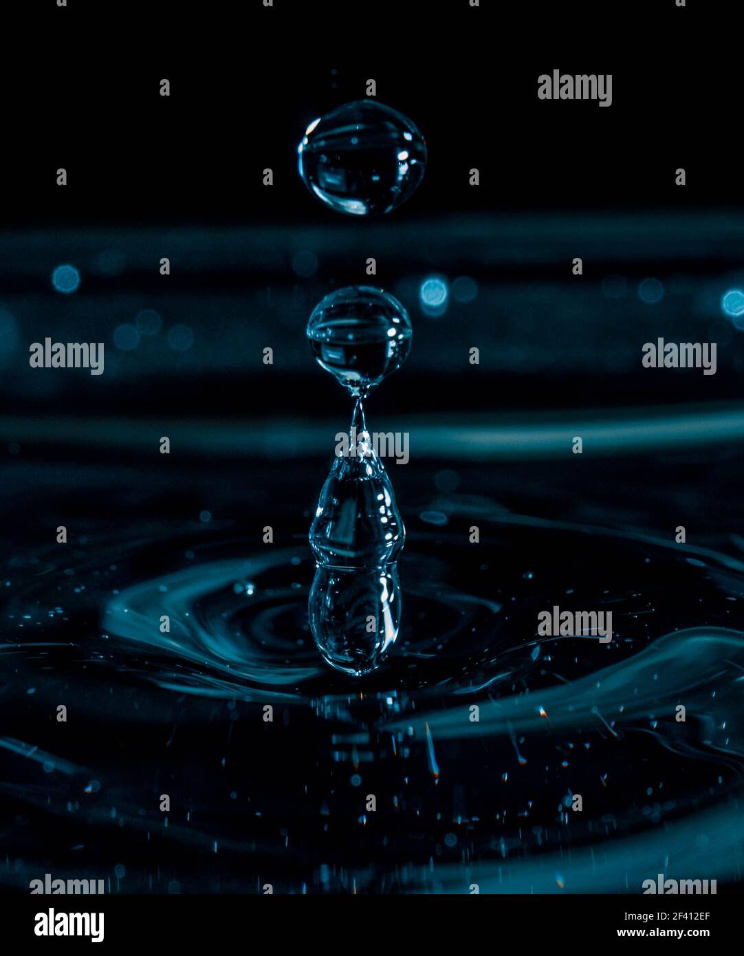 Colored water drop, circle ripples, splash of water, closeup Stock ...