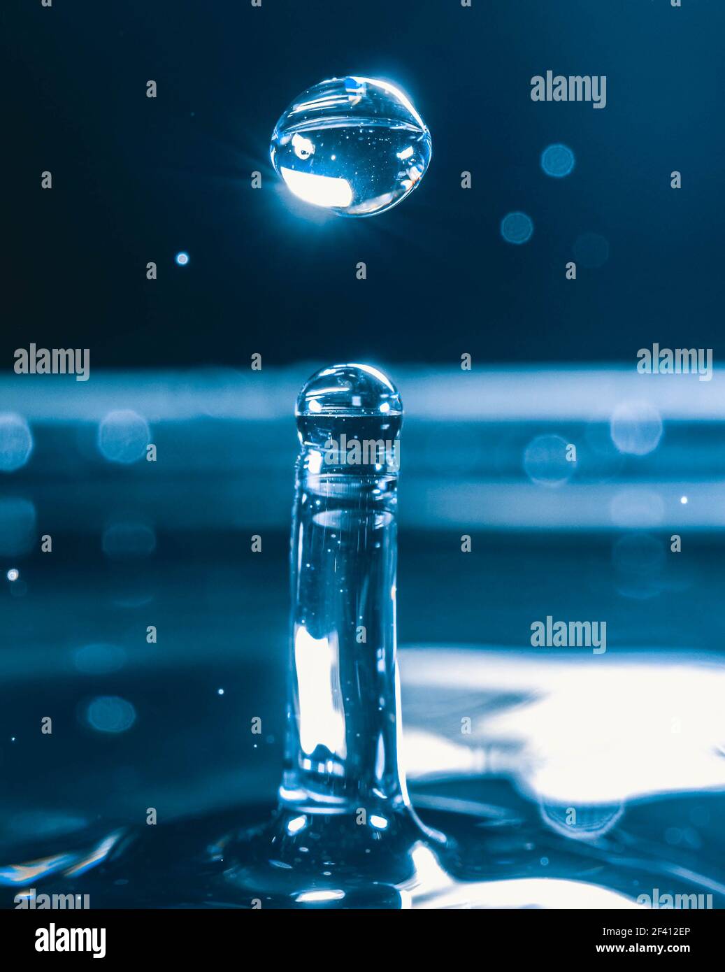 Colored water drop, circle ripples, splash of water, closeup Stock ...