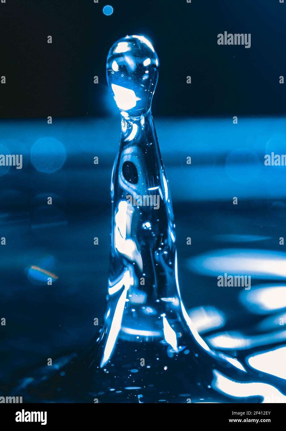 Colored water drop, circle ripples, splash of water, closeup Stock ...