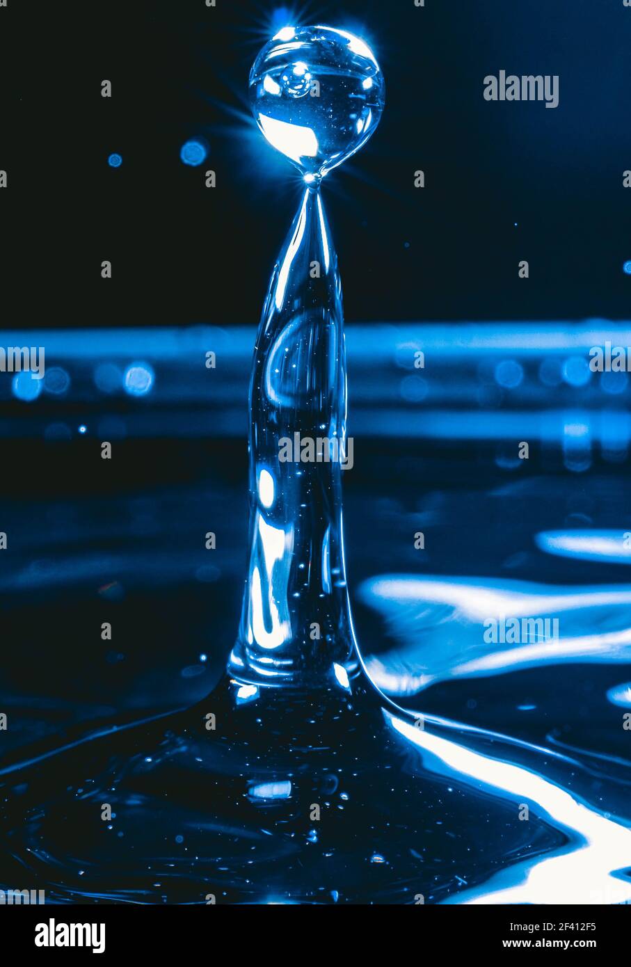 Colored water drop, circle ripples, splash of water, closeup Stock ...
