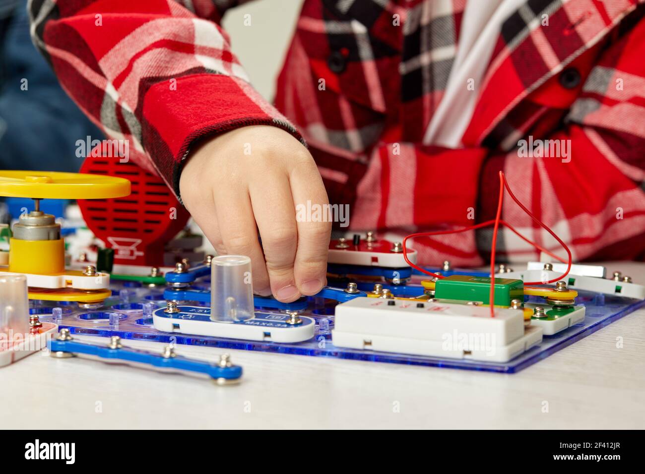 children playing with electronic constructor at studio Stock Photo - Alamy