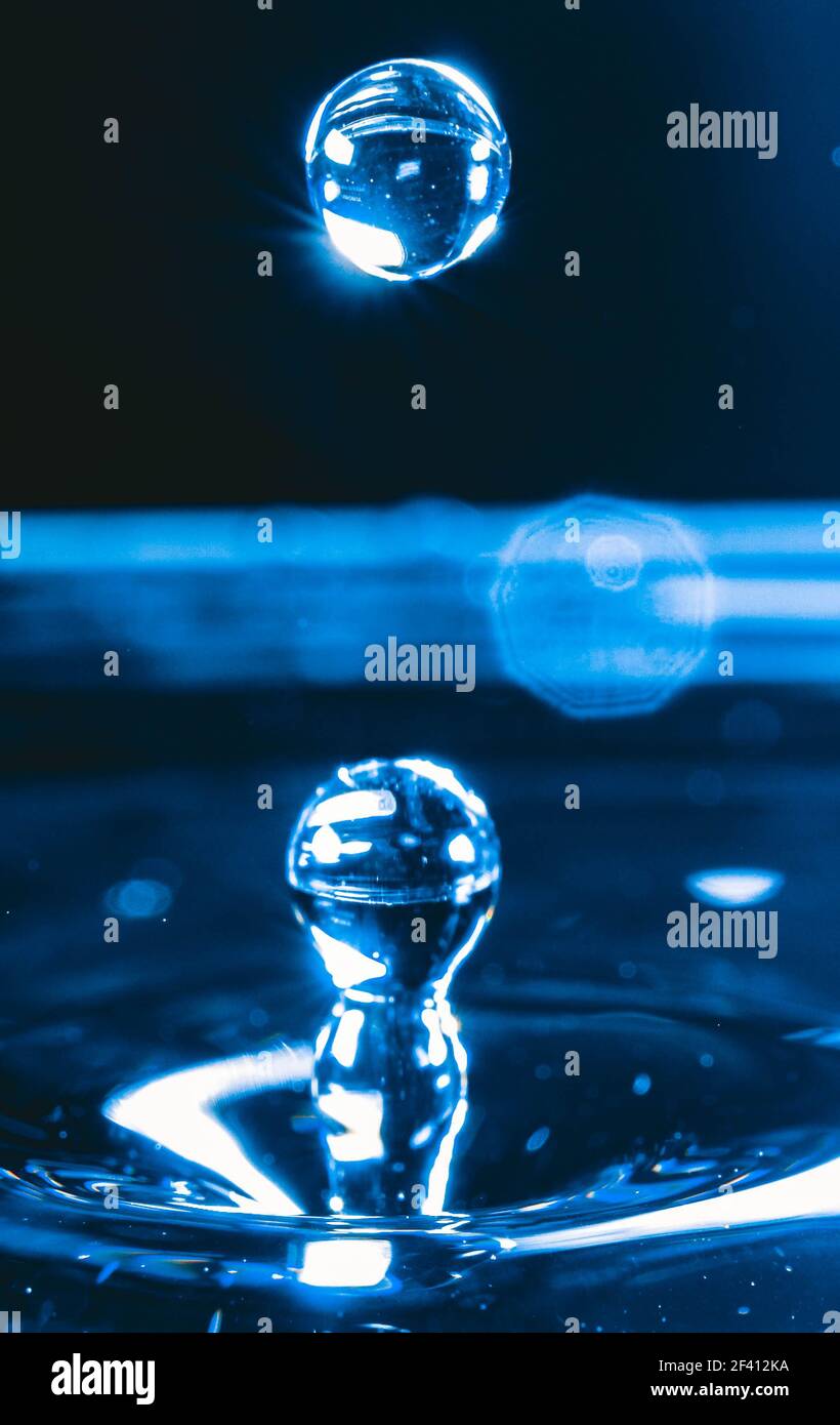 Colored water drop, circle ripples, splash of water, closeup Stock ...