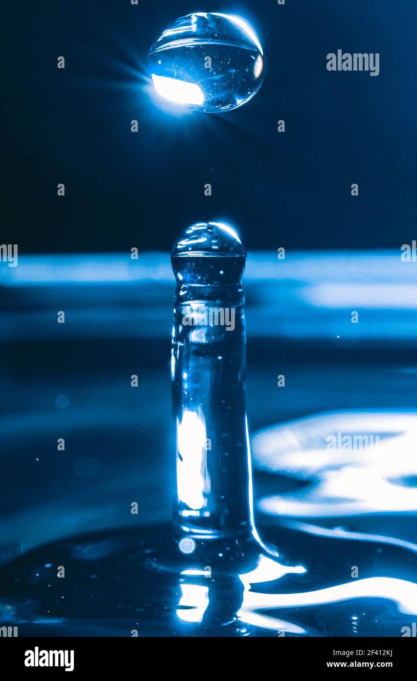 Colored water drop, circle ripples, splash of water, closeup Stock ...