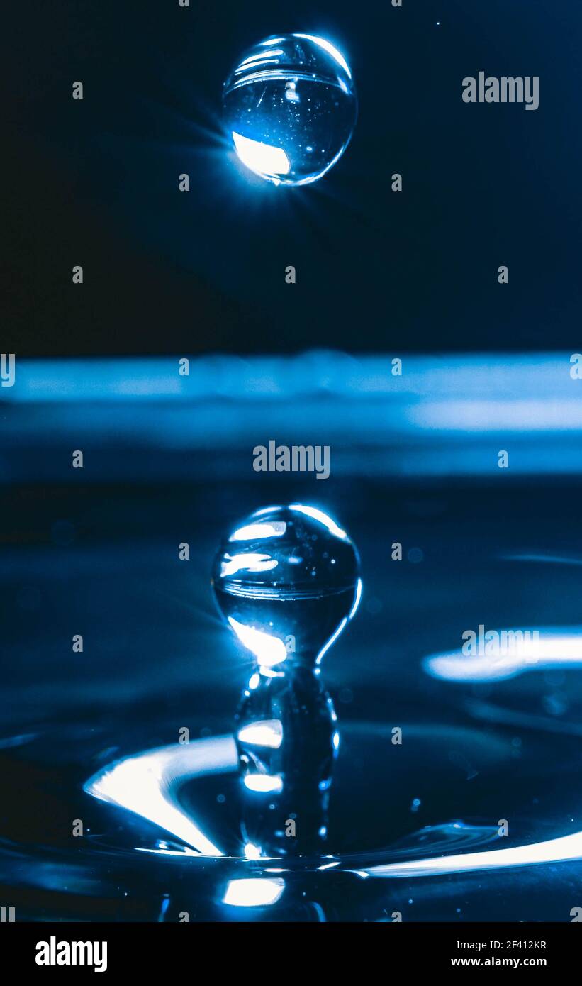 Colored water drop, circle ripples, splash of water, closeup Stock ...