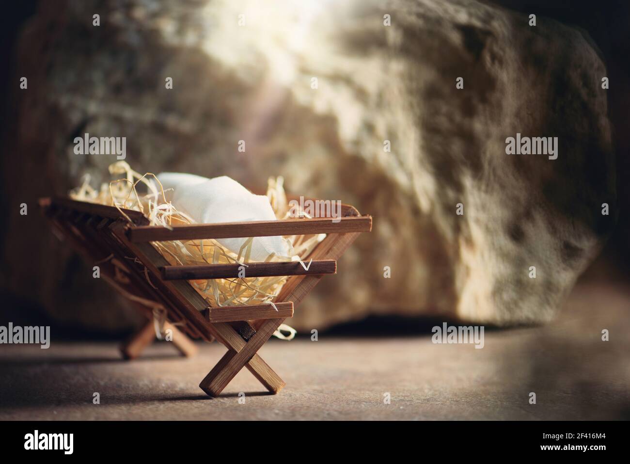 Christian Christmas concept. Birth of Jesus Christ. Wooden manger in ...