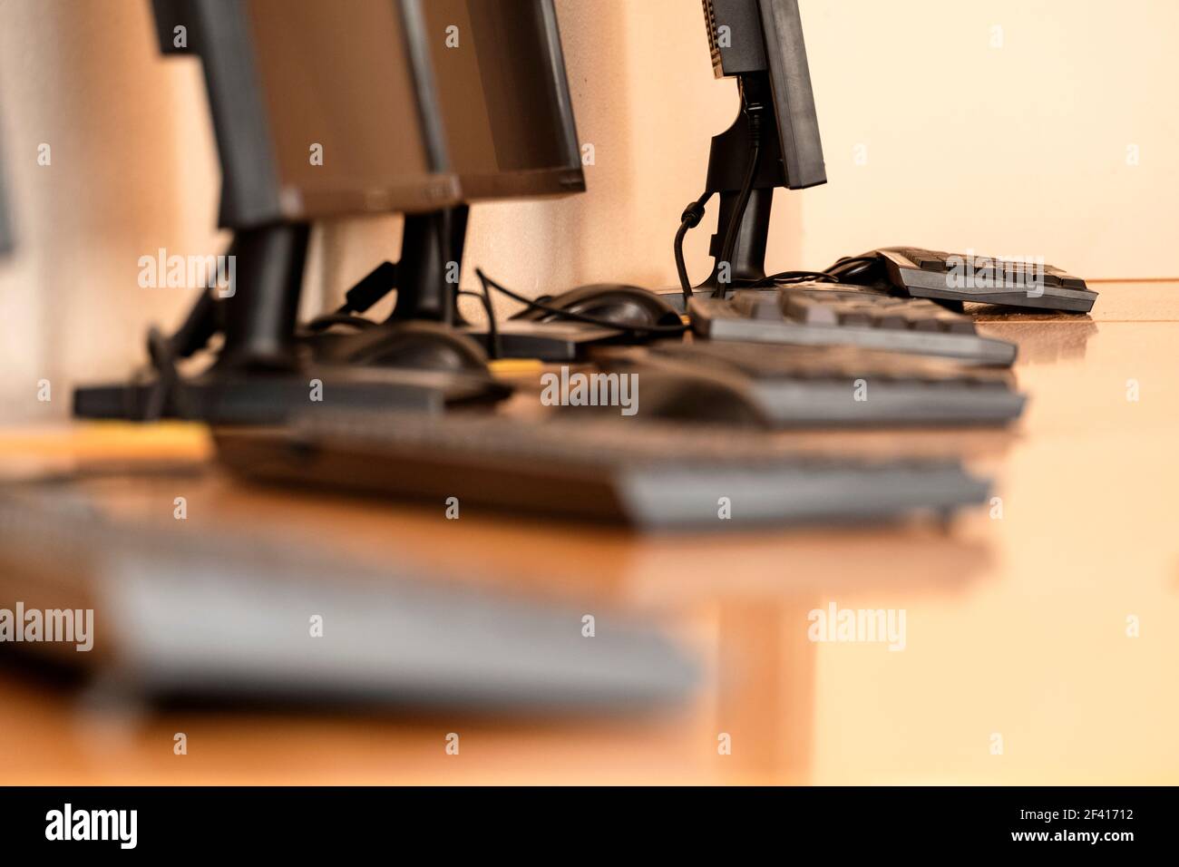 Closeup of interior of classroom with computers with room for text ...